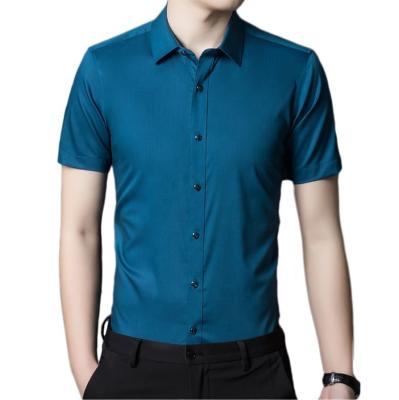 Cina T-shirt da lavoro da uomo con manica corta in formale Top da ufficio a colori solidi Buttone in basso OEM in vendita
