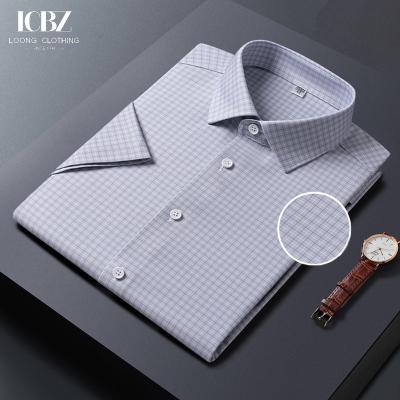 Cina Stampa di logo personalizzata Camicie da lavoro da uomo di cotone Abito da ufficio formale Camicia a quadri in vendita