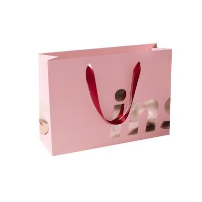 China Self Erecting Kraft Christmas Gift Bags Printed Branded Packaging for sale