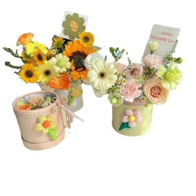 China Custom Order Accepted Small Round Bucket Packaging Cardboard Boxes with Custom Logos for sale