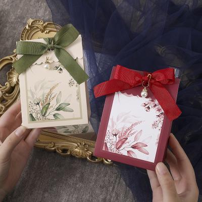 China Custom Luxury Lily Of The Valley Hand Candy Gift Box With Your Own Logo For Market for sale