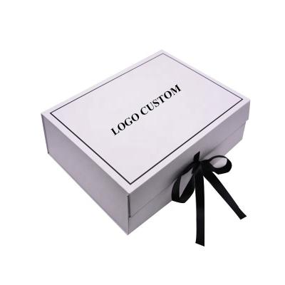 China Cloth LV Customized Gift Foldable box Ribbon hardpaper cardboard gift boxes Flip Top String Ribbon Handle Flat Paper Box for sale