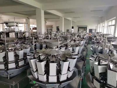 Cina Pesatore di combinazione di Multihead dell'alimento dello strato di pesatura capa 10 e della macchina imballatrice in vendita
