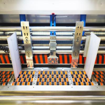 China 4 Colours Corrugated Carton Flexo Printing Machine With Slotting Die Cutting 250pcs/min for sale