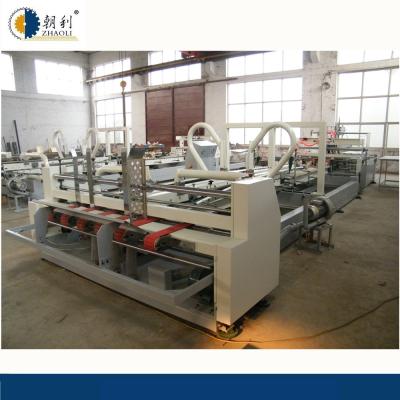 Cina Cartone ondulato a macchina di Gluer della cartella ad alta velocità del cartone che incolla macchina in vendita
