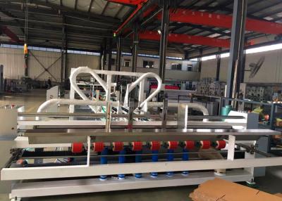 Cina L'alimentatore dell'adsorbimento di vuoto ha ondulato il popolare della scatola e la macchina imballatrice della colla/la macchina imballatrice contenitore di cartone in vendita