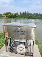 China Automatic Timer Motorized Fish Feeder Feed Loading Machine 45 Packs Per Hour System for sale