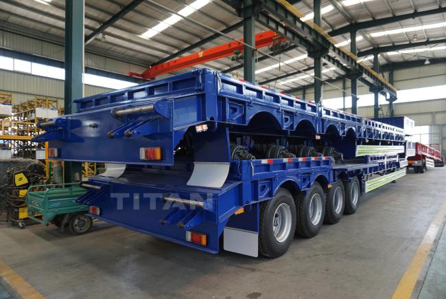 We can offer a heavy machine loading low loader trailer with different colors.