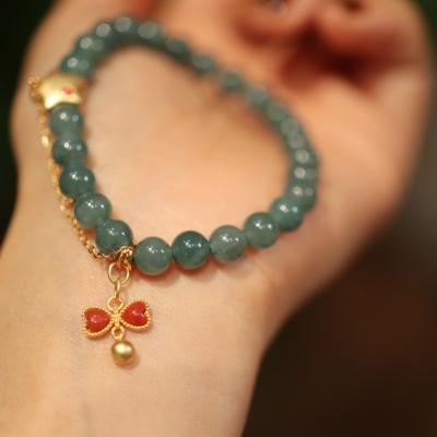 Chine Nouveau bracelet en jade naturel fait à la main lumière naturelle vert blanc jade chinois bracelets à perles rondes femmes Reiki soins de santé de guérison Bracelets à fils d'énergie à vendre