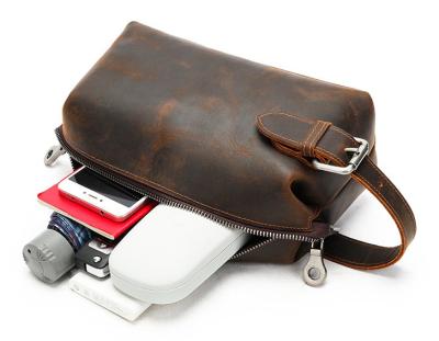 China Crazy horse leather vintage toiletry bag Genuine Leather Woven Clutch Bag Unisex Portable Handheld Storage Bag Leather Large Capacity Toiletry Bag Wholesale for sale