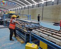 China Interior And Exterior Wall Panel Production Line With Multi Function Wet Casting Doser Machine for sale