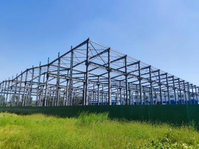China Hot Rolled Steel Q235 Q345B Prefab Steel Warehouse With H Beam Portal Frame for sale