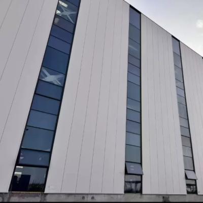 China Rigid Steel Frame Structure Prefabricated Warehouse Workshop Metal Building with Custom Cladding for sale