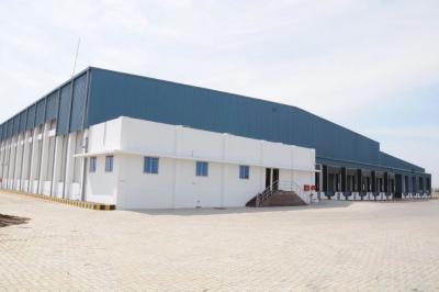 Cina 10000 piedi quadrati Q235 hanno prefabbricato il gruppo di lavoro delle costruzioni metalliche in vendita