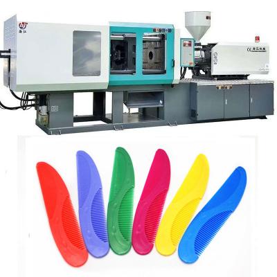 China High Efficiency Two Color Rainboot Injection Molding Machine With Cooling System for sale