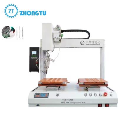 China 精密な操作のためのインテリジェント制御4軸のダブルプラットフォーム溶接機 for sale