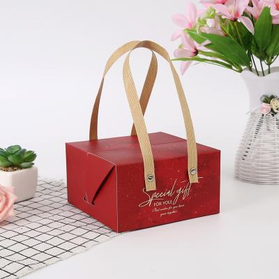 Cina Contenitore d'imballaggio di torta di compleanno di carta antiusura riciclabile con le maniglie multiuso in vendita