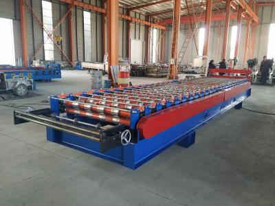 China rollo modelo de la chapa del tejado del ibr del color del precio bajo 1050 que forma la máquina en venta