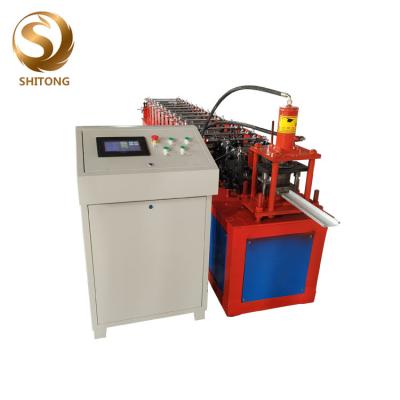 China Hot sale color channel roller steel shutter door roll forming machine for sale