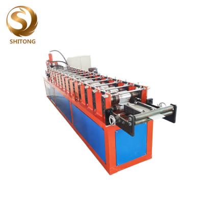 China Hot sale color channel roller steel shutter door roll forming machine for sale