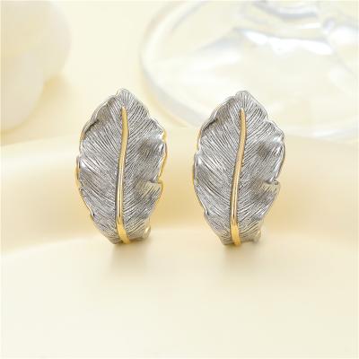 China Hot Selling Fashion Two Tone Plated Feather Hypoallergenic Silver Pin Stud Earrings Women Birthdays Parties Anniversaries Gift for sale