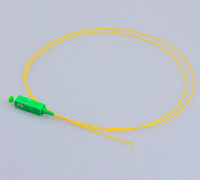 China SC/APC SM simplex 0.9mm Fiber Optic Pigtail yellow color PVC outer cable jacket for sale