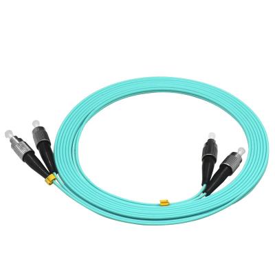 中国 3.0mm アクアグリーン マルチモード OM3 デュプレックスファイバーパッチコード 販売のため