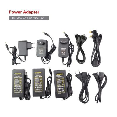 China AC to DC 12V 24V 1A 2A 3A 5A 6A 8A Switching Power Supply Charger Adapter 5.5x2.5mm EU US AU UK Plug for sale