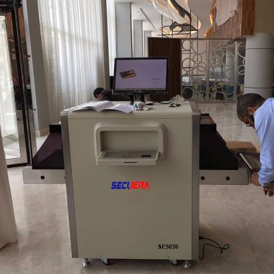 Cina Poca singola perdita della palestra/H dell'analizzatore 0,01 del bagaglio di X Ray con i suoni e la macchina leggera dell'analizzatore del bagaglio del raggio dell'allarme x in vendita