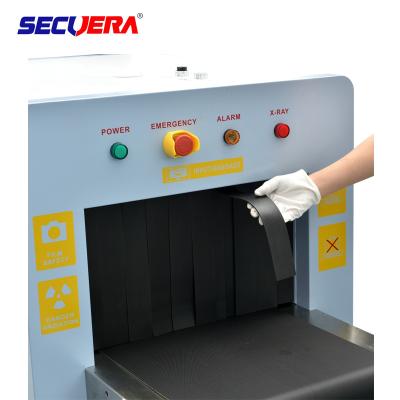 Chine Scanner fiable stable de bagages de X Ray avec la ligne machine en métal de 0.0787mm de rayon du scannerbag X de rayon de la sécurité X de résolution de fil à vendre