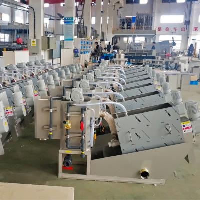 China Dewatering Multi Disc Screw Press Stacked Screw Sludge Dehydrator System for sale