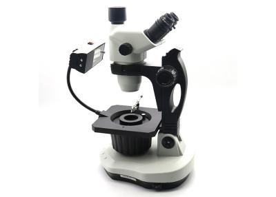 China Brazo oscilante 10X-67.5X Gem Trinocular Microscope con la base oval en venta
