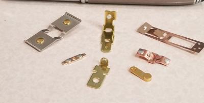 China Custom Stamped Sensor Contacts – Precision Metal Stamping for Medical Monitoring Devices for sale
