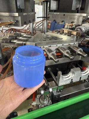 China synchronized injection blowing machine self adhesive bottle bagging machine for sale