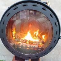 China Wall Mounted Wood Burning Floating Fireplace Hanging Ceiling Round Design Fireplace for sale