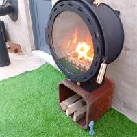 China Wall Mounted Wood Burning Floating Fireplace Hanging Ceiling Round Design Fireplace for sale