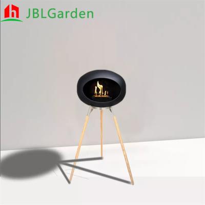 China Indoor Free Standing Real Fire Ethanol Fireplace Corten Steel Material for sale