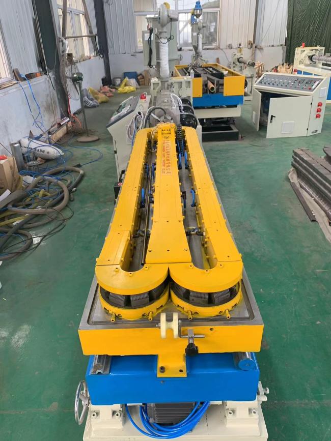 Close-up view of HDPE Corrugated Pipe Extrusion Line components and control panel