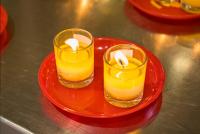 China Customized 2.5OZ Floating Glass Tea Light Candle Holders For Wedding for sale