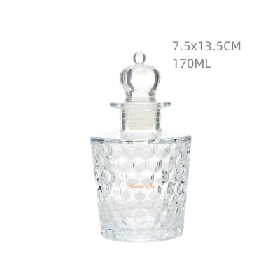 Cina OEM bottiglie di vetro diffusore di canna bottiglie di profumo in vetro trasparente in rilievo in vendita
