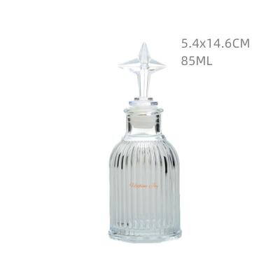 China Airtight Small Glass Diffuser Bottles 85ML With Fancy Cap LFGB for sale