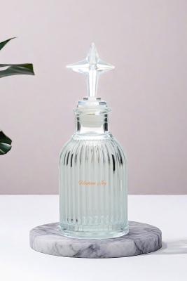 China Airtight Small Glass Diffuser Bottles 85ML With Fancy Cap LFGB for sale