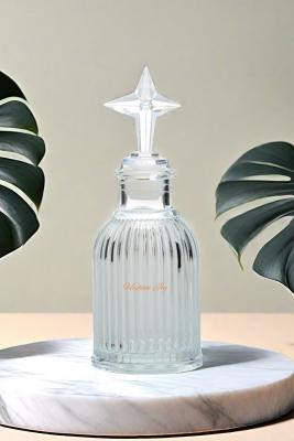 China Airtight Small Glass Diffuser Bottles 85ML With Fancy Cap LFGB for sale