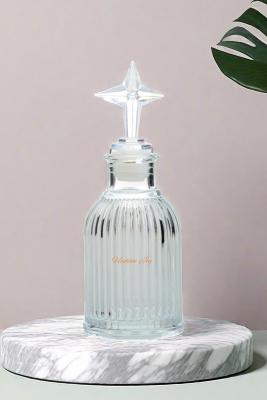 China Airtight Small Glass Diffuser Bottles 85ML With Fancy Cap LFGB for sale