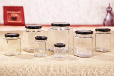 Cina Vetro operato Honey Jars, certificazione d'inscatolamento di vetro del quadrato dello SGS dei barattoli in vendita