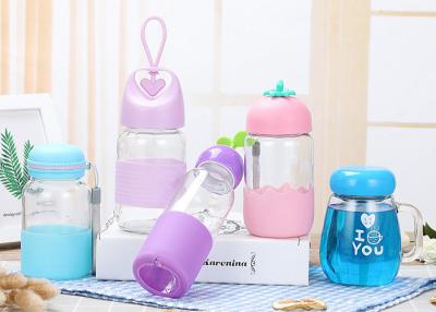 Cina bottiglie beventi di vetro 300ml con la caratteristica amichevole di Eco della copertura del silicone in vendita