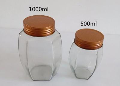 China Característica de vidro sextavada oval de Honey Jars Transparent Color Moistureproof à venda