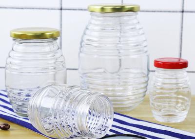 Cina 4 vetri borosilicati del carro armato di Oz Honey Jars Transparent Spiral Storage alti in vendita