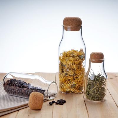 Cina 150 ml di vetro decorativo di 330 ml imbottigliano/barattoli di vetro di stoccaggio con Cork Lid in vendita