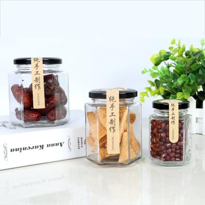 Cina Barattoli di vetro a forma di esagonali di stoccaggio del coperchio a vite, inceppamento Honey Jars di vetro della spezia in vendita